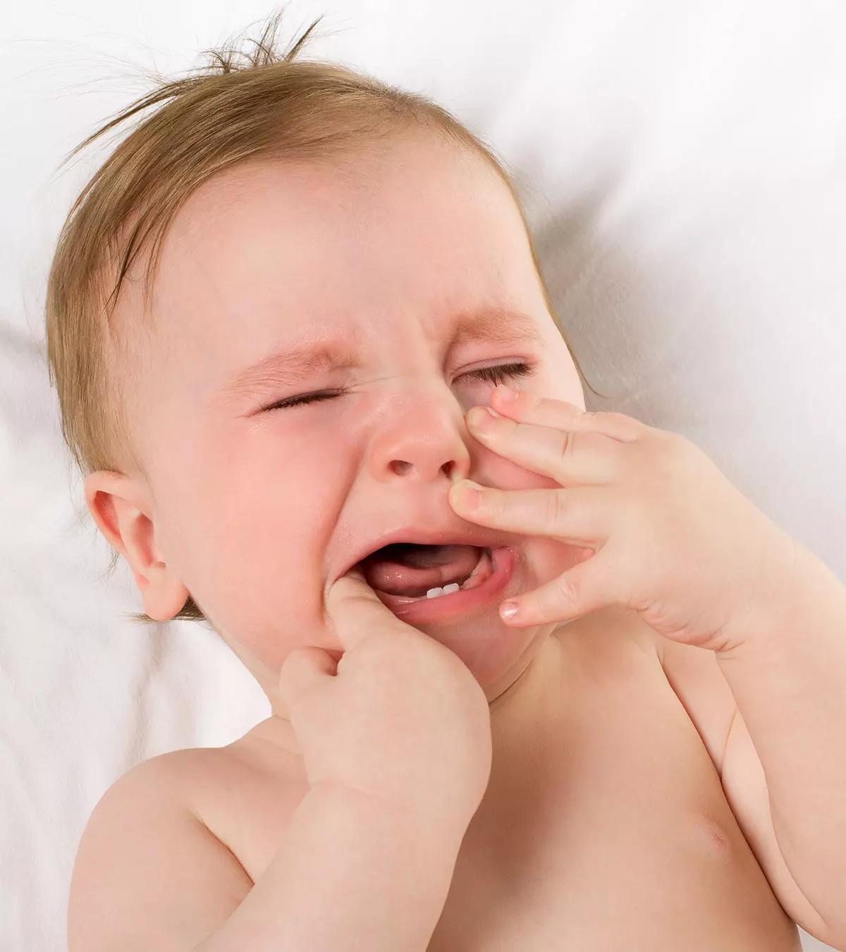 8 Remedies To Treat Swollen Gums In Babies When Teething