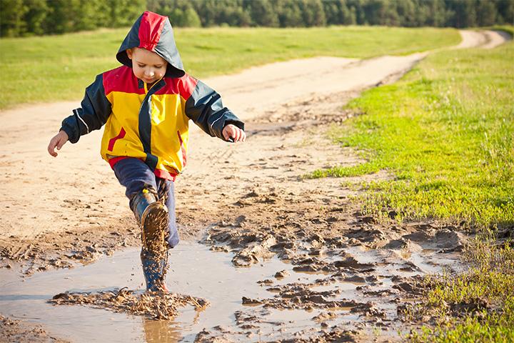 Kids Playing In The Mud