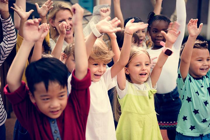 Group Of Kids Waving Goodbye